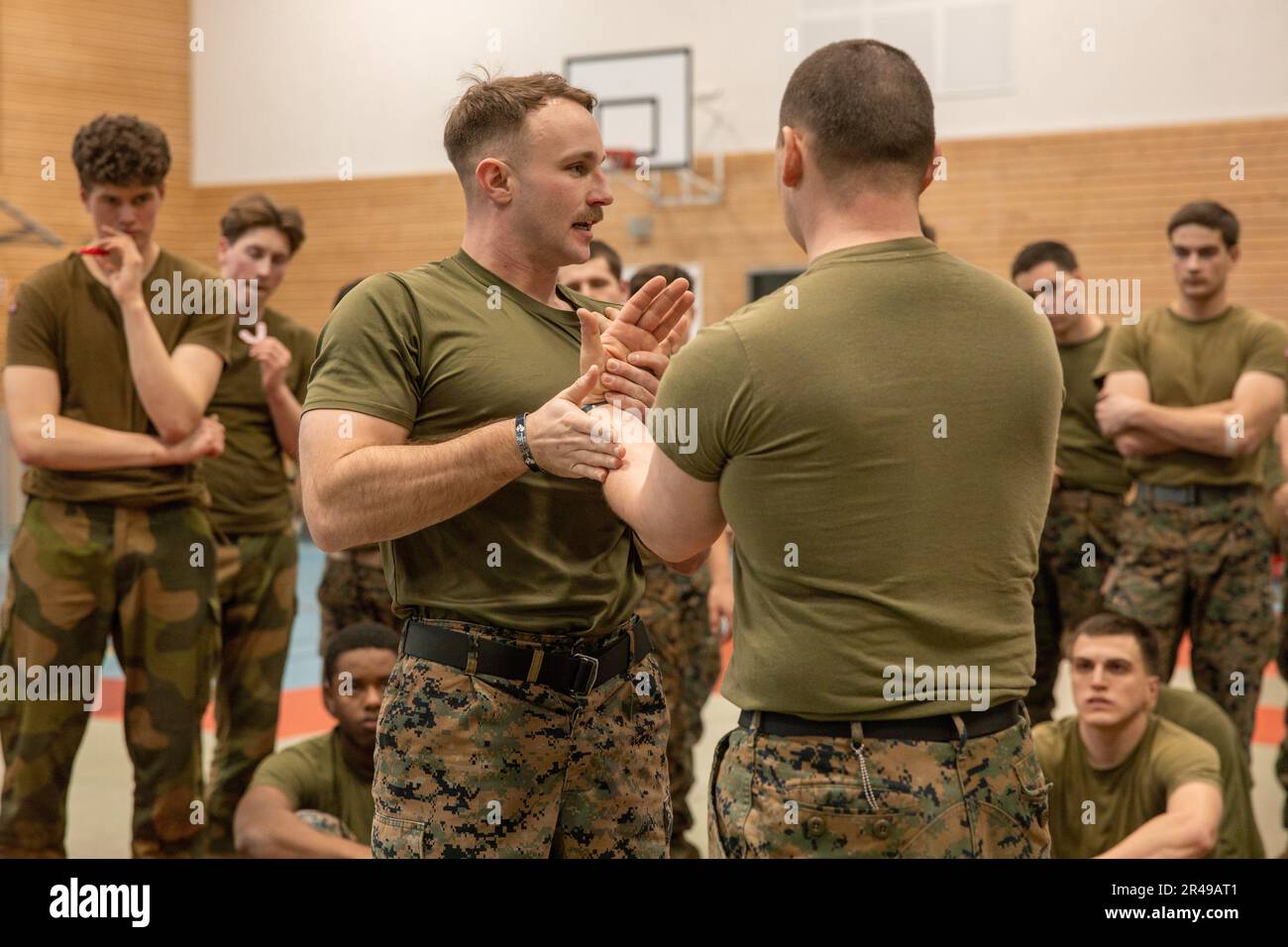 U.S. Marine Corps Staff Sgt. Brian Bessey (left), a martial arts ...