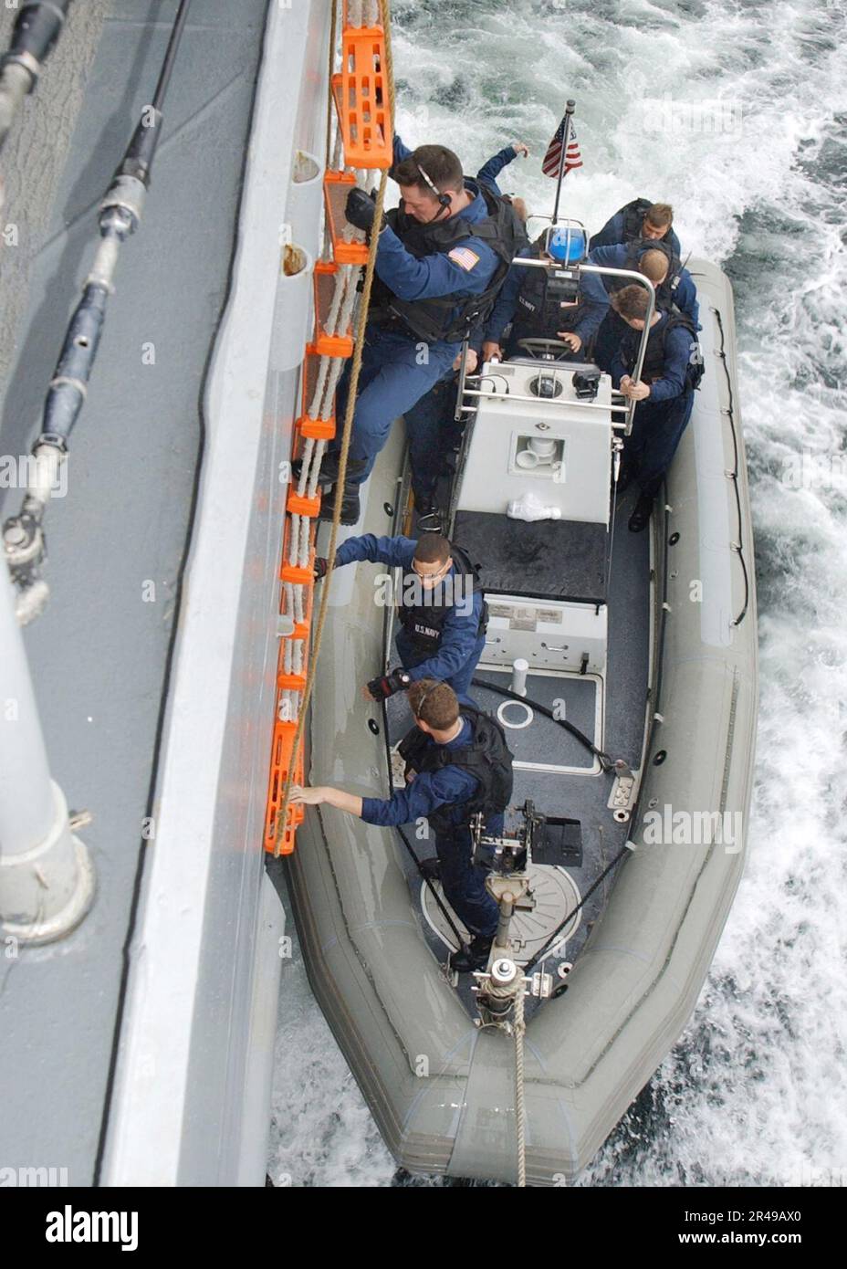 US Navy A member of Vessel Boarding Search and Seizure (VBSS) team from ...