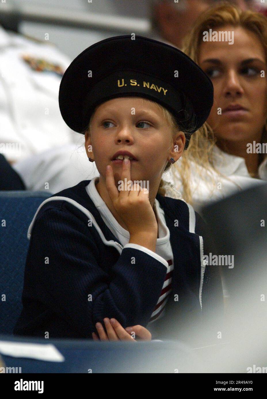 US Navy Family members of U.S. Navy Sailors watch a recent recruit ...