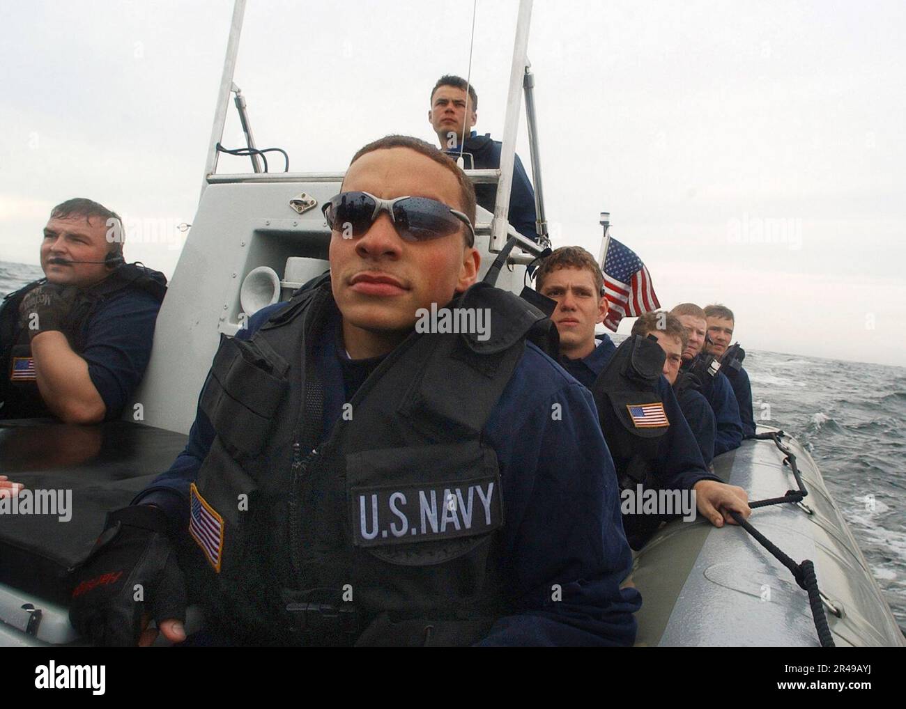 US Navy Members of the Vessel Boarding Search and Seizure (VBSS) team ...