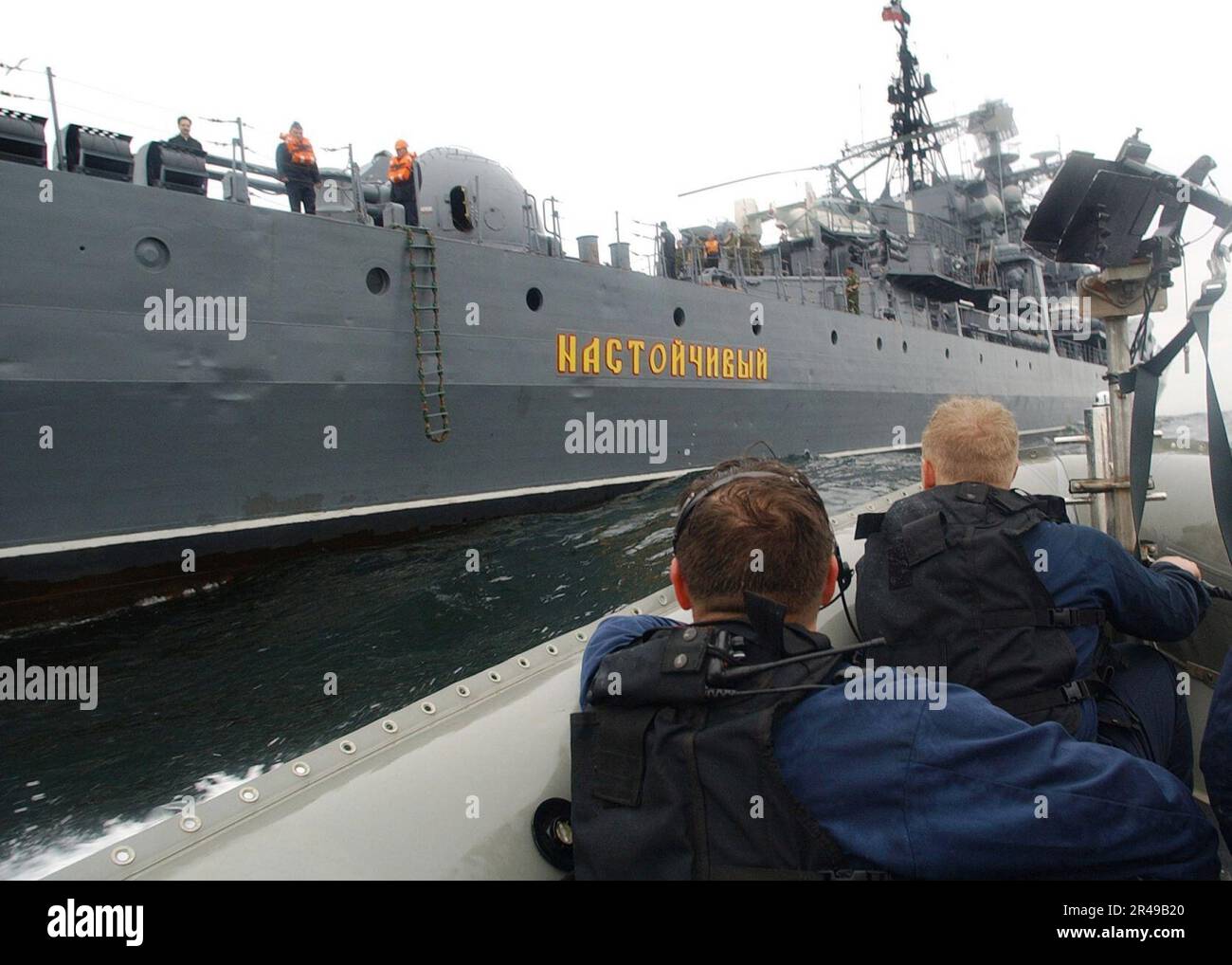 US Navy Members of the Vessel Boarding Search and Seizure (VBSS) team ...