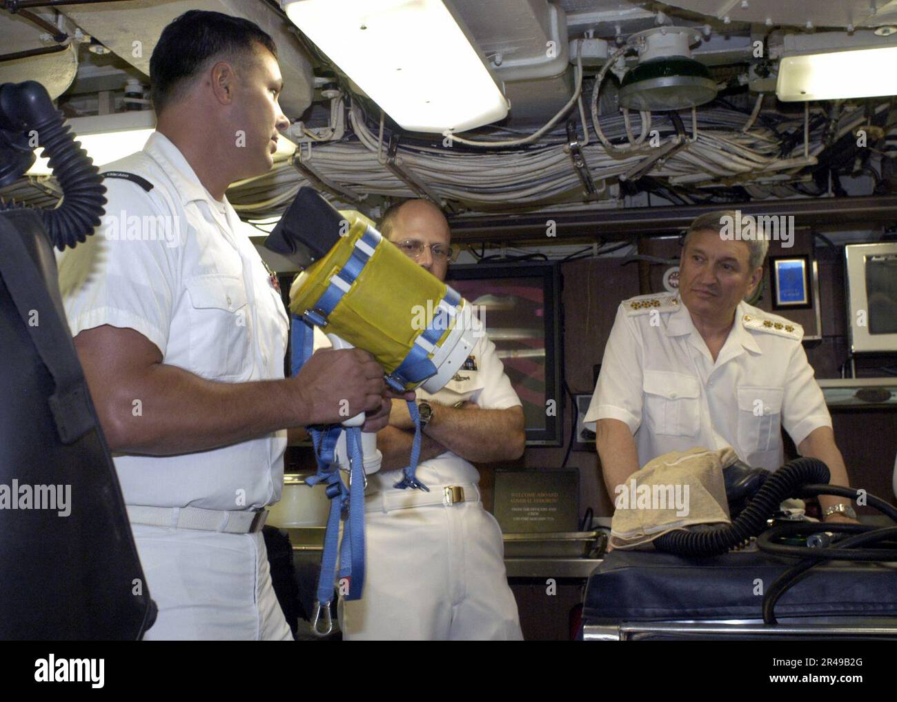 US Navy A crewmember assigned to the attack submarine USS Chicago (SSN ...