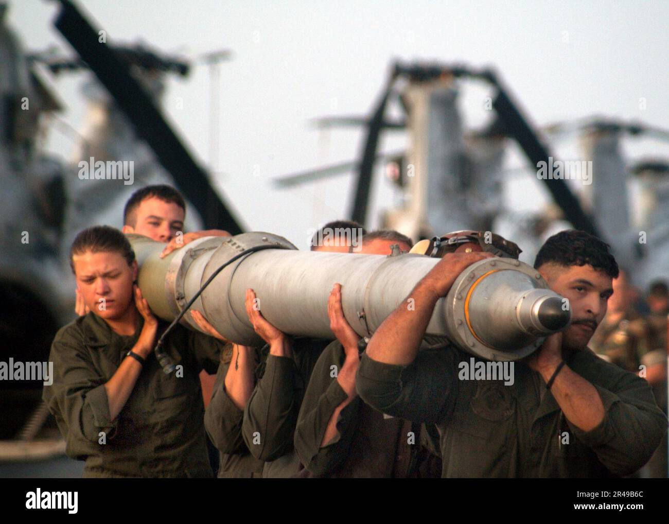 US Navy Marines assigned to Marine Air Group Twenty Nine (MAG-29) carry ...