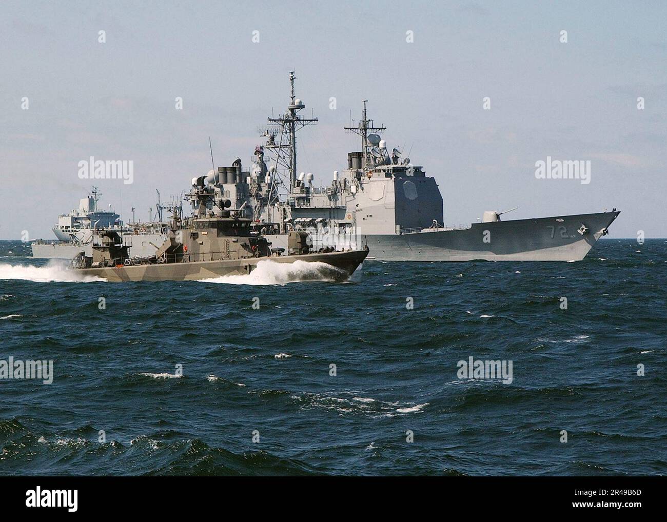 US Navy A Finish Rauma-class fast patrol boat, steams along side the ...