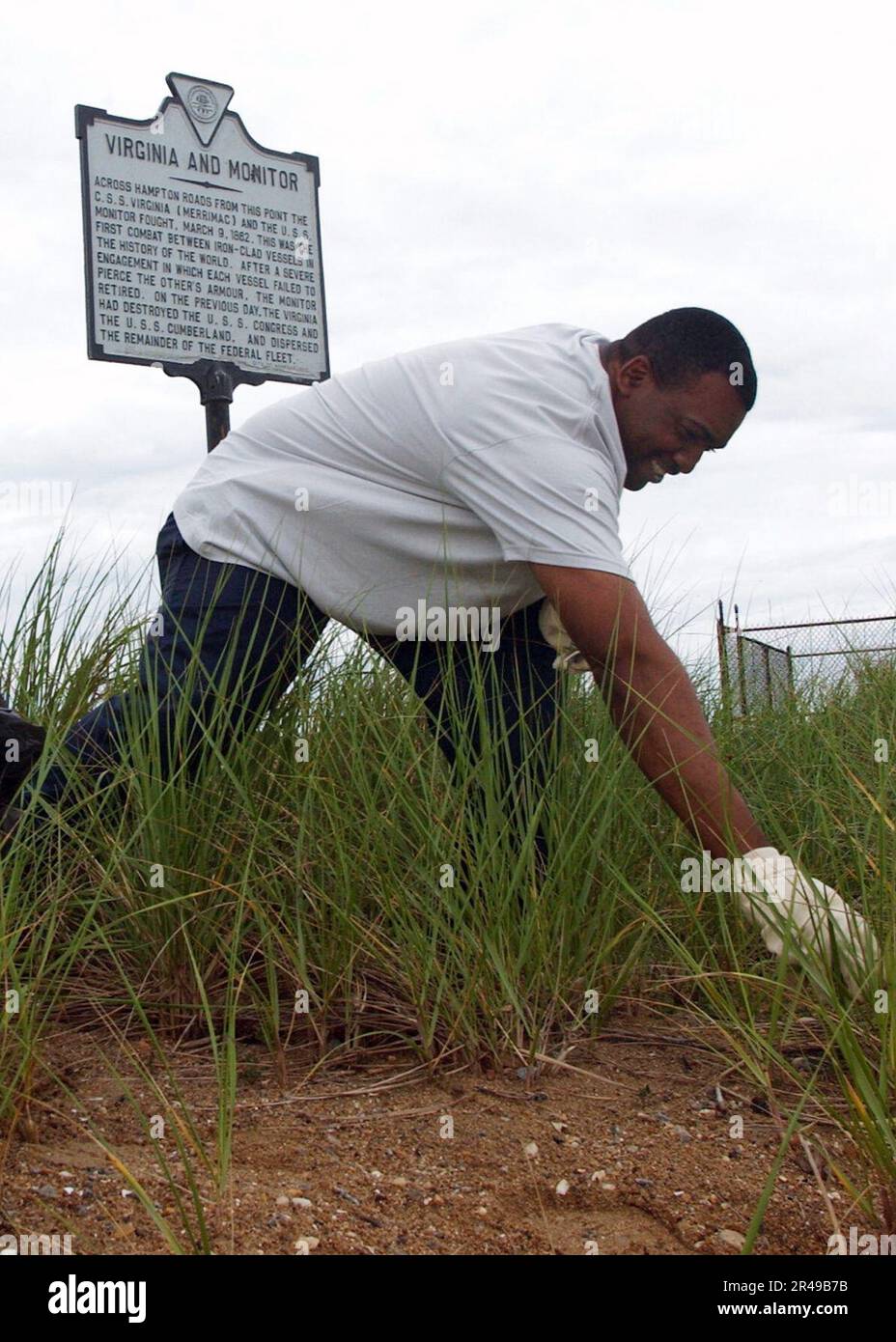US Navy Gunner's Mate 1st Class volunteers his time to help out during ...