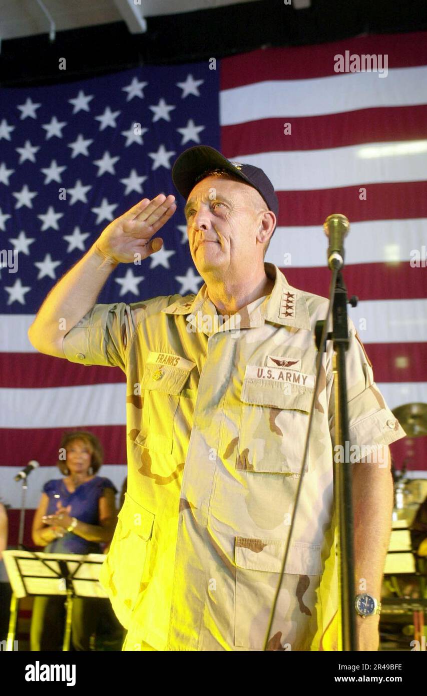 US Navy Gen. Tommy Franks speaks to crewmembers during a visit aboard ...