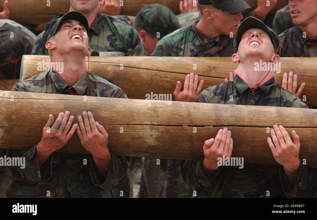 US Navy Basic Underwater Demolition-SEAL (BUD-S) students participate in Log PT (physical ...