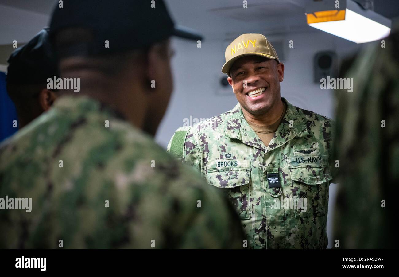 Capt. Kertreck Brooks, commanding officer, speaks with recruits during ...