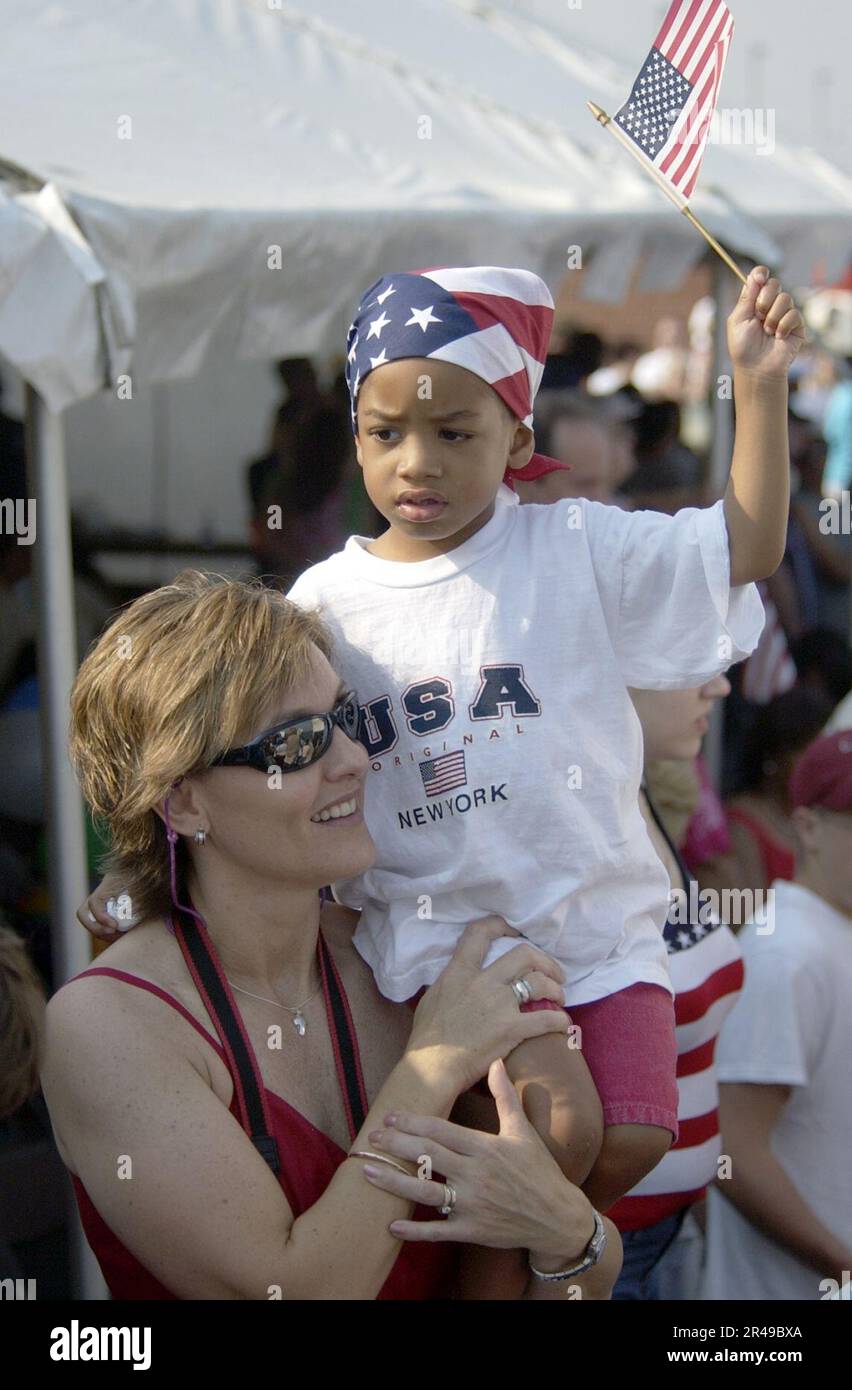 US Navy Friends and Family members gather on the pier to welcome home ...