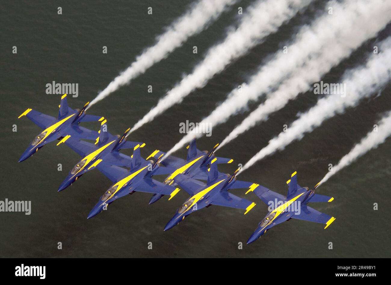 US Navy The Blue Angels fly a Delta formation low over the waters near ...