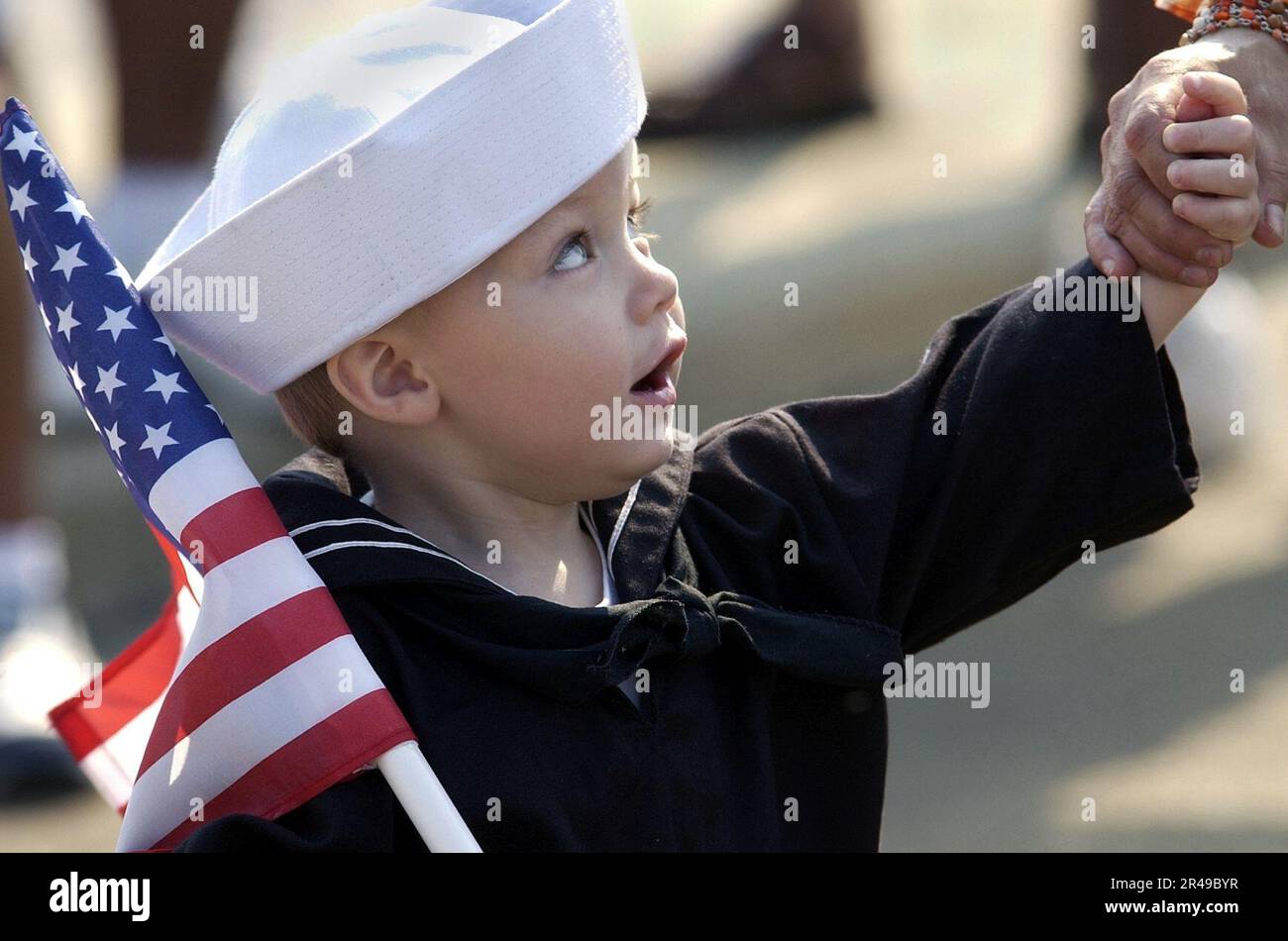 US Navy Friends and Family members gather on the pier to welcome home ...