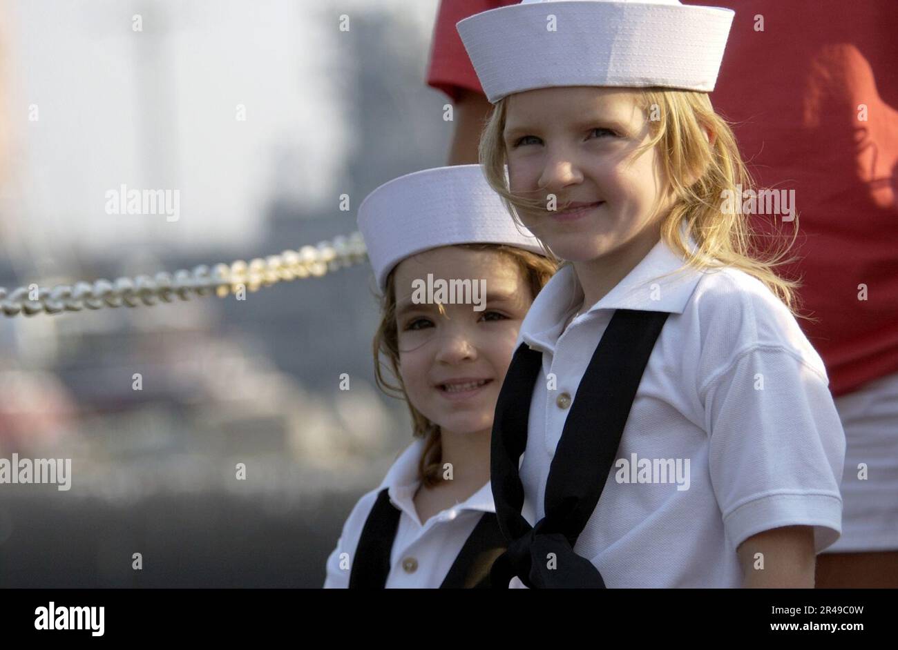 US Navy Friends and Family members gather on the pier to welcome home ...