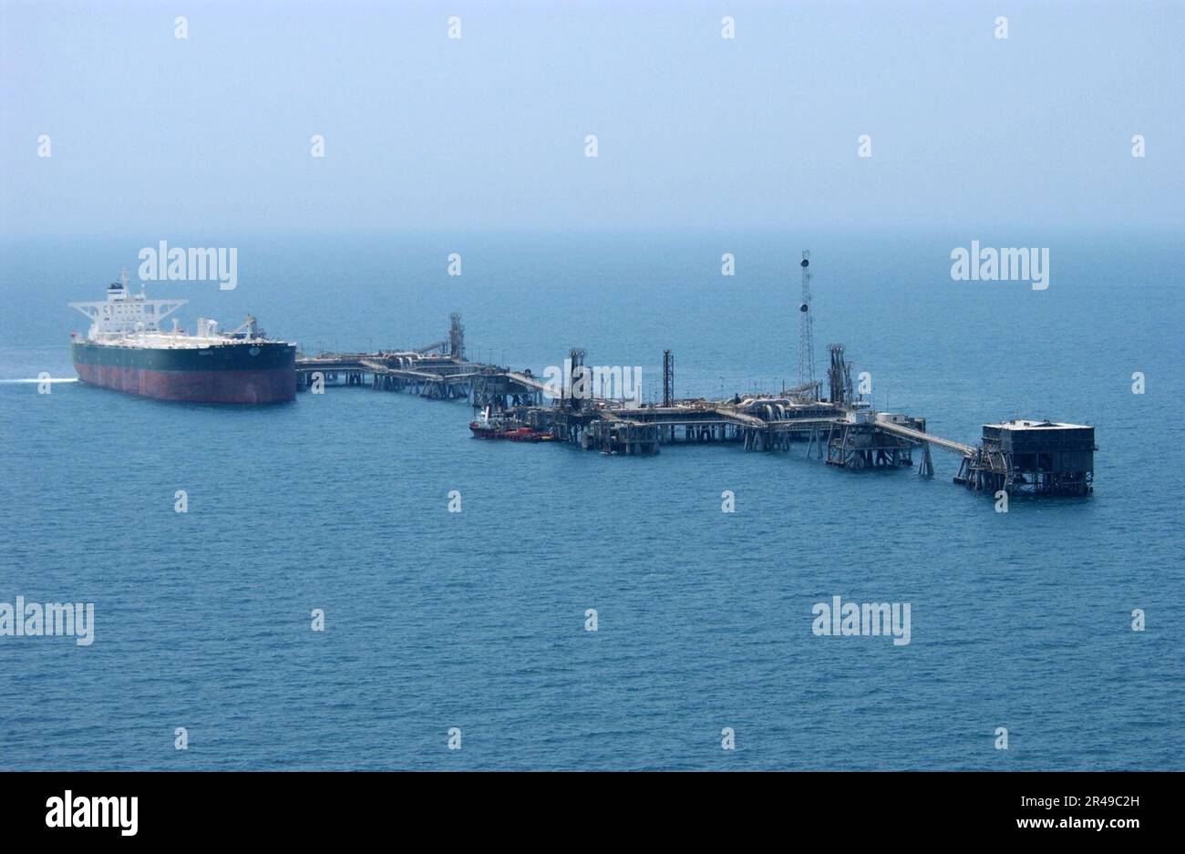 US Navy Commercial oil tanker AbQaiq readies itself to receive oil at ...