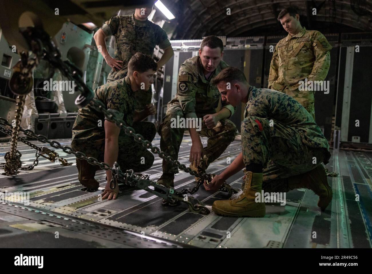 U.S. Marines and Airmen heavy-duty steel chains to secure heavy ...