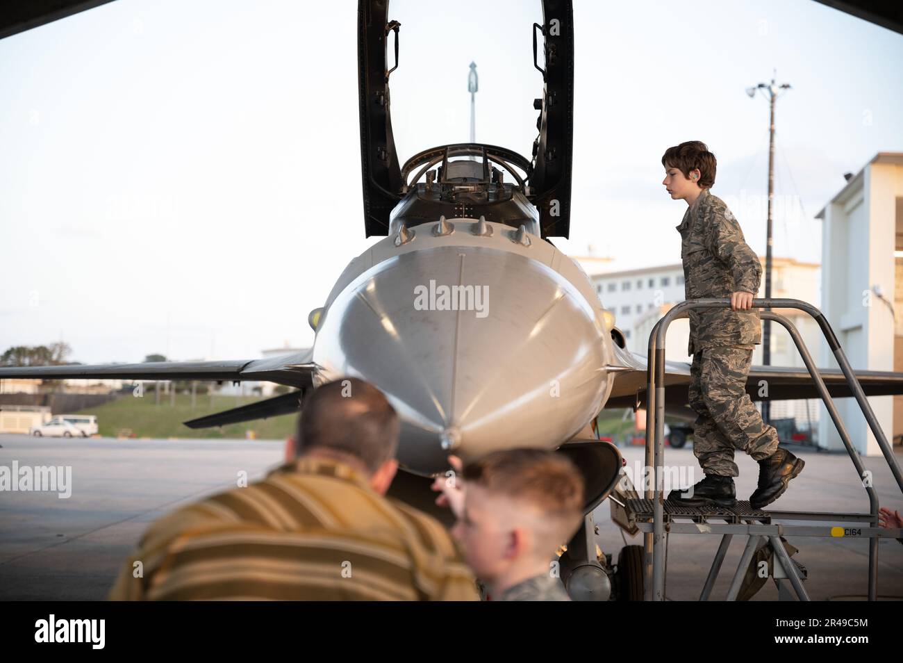 A member of the Civil Air Patrol Okinawa Cadet Squadron peers into the ...