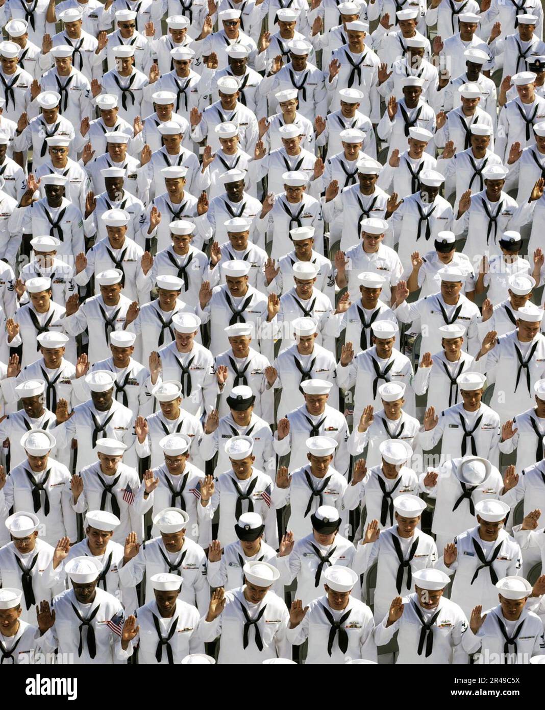 US Navy Sailors and U.S. Marines take the Oath of Citizenship held on ...