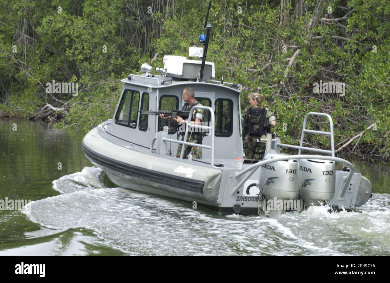 US Navy Master-at-Arms 2nd Class left, and Machinist's Mate 1st Class ...