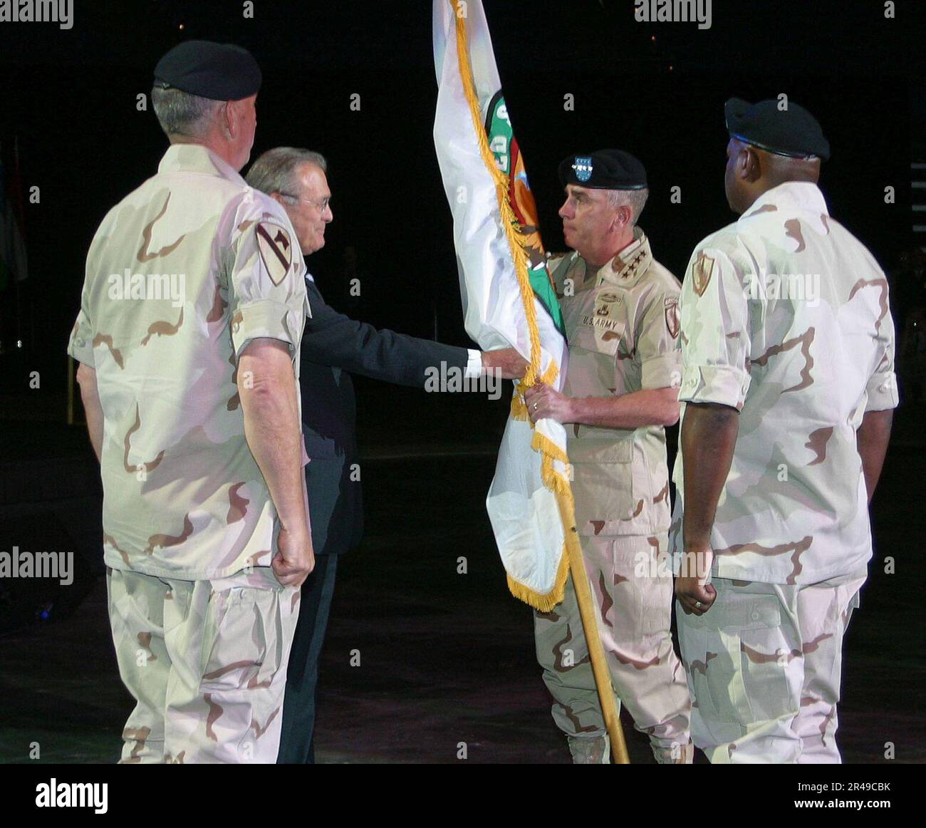US Navy U.S. Army Gen. John P. Abizaid accepts the command flag from ...