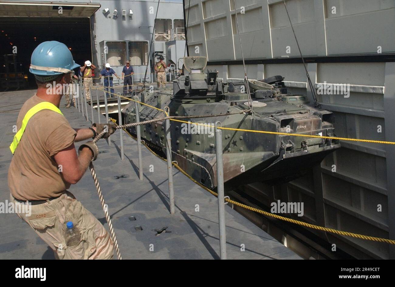 US Navy Personnel assigned to the Navy's cargo handling and port group ...
