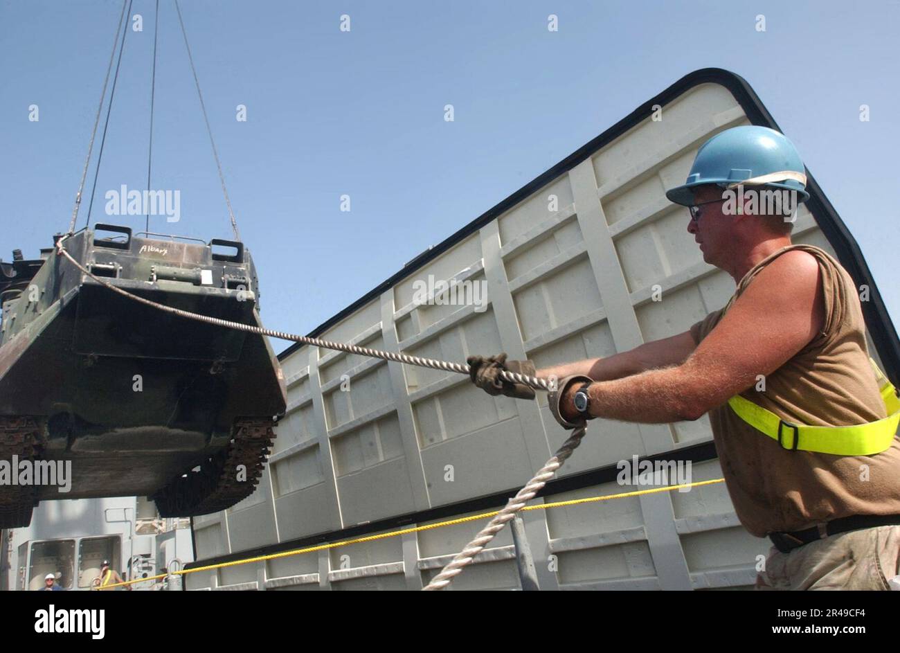 US Navy Personnel assigned to the Navy's cargo handling and port group ...