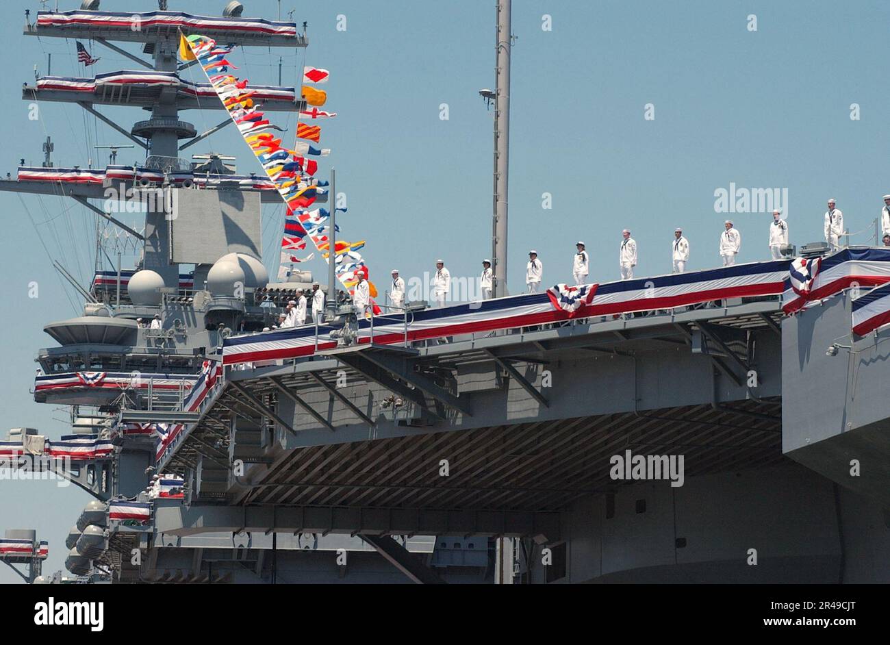 US Navy Sailors stationed aboard the Navy's newest aircraft carrier ...