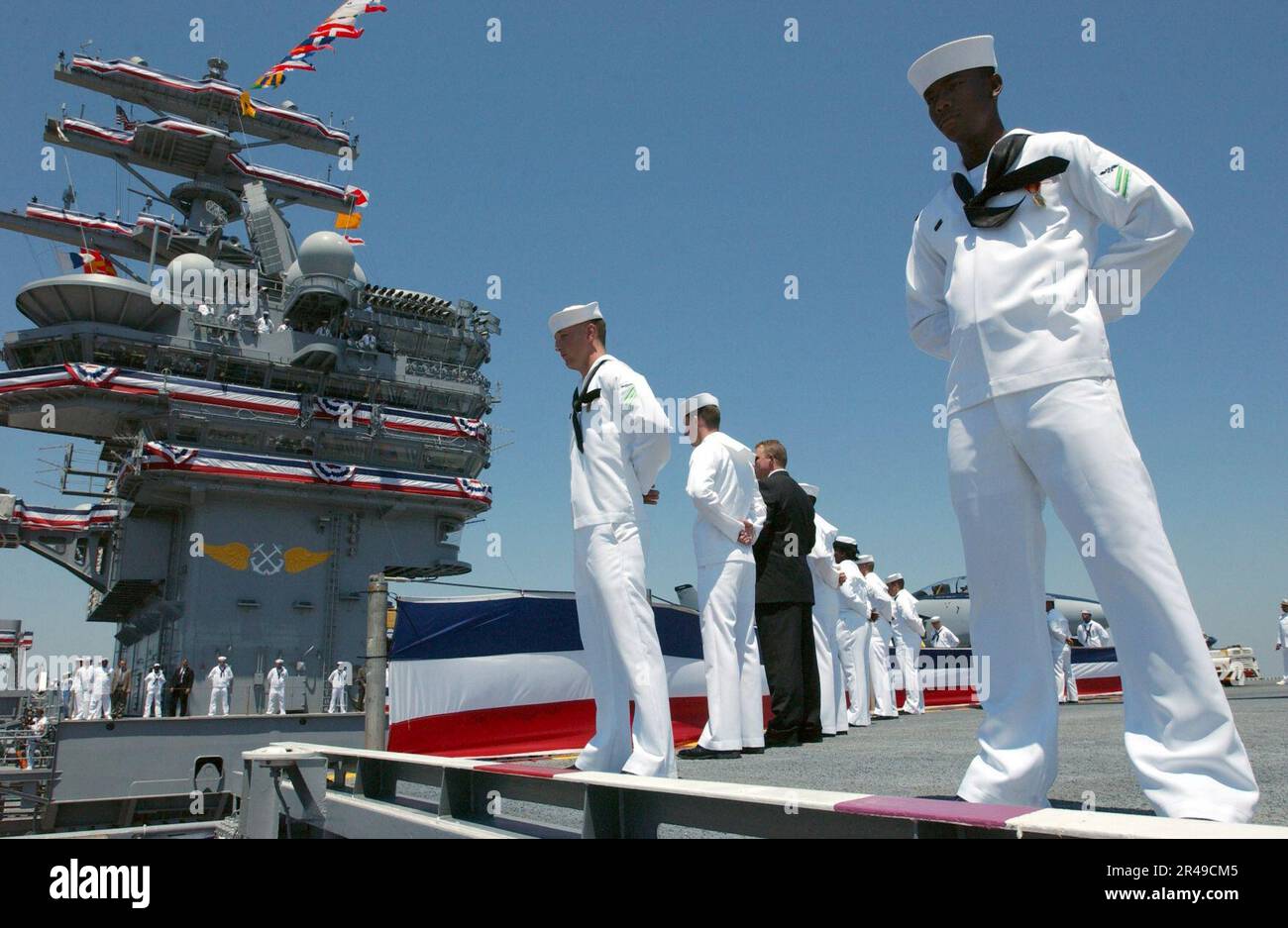 US Navy Sailors stationed aboard the Navy's newest aircraft carrier ...