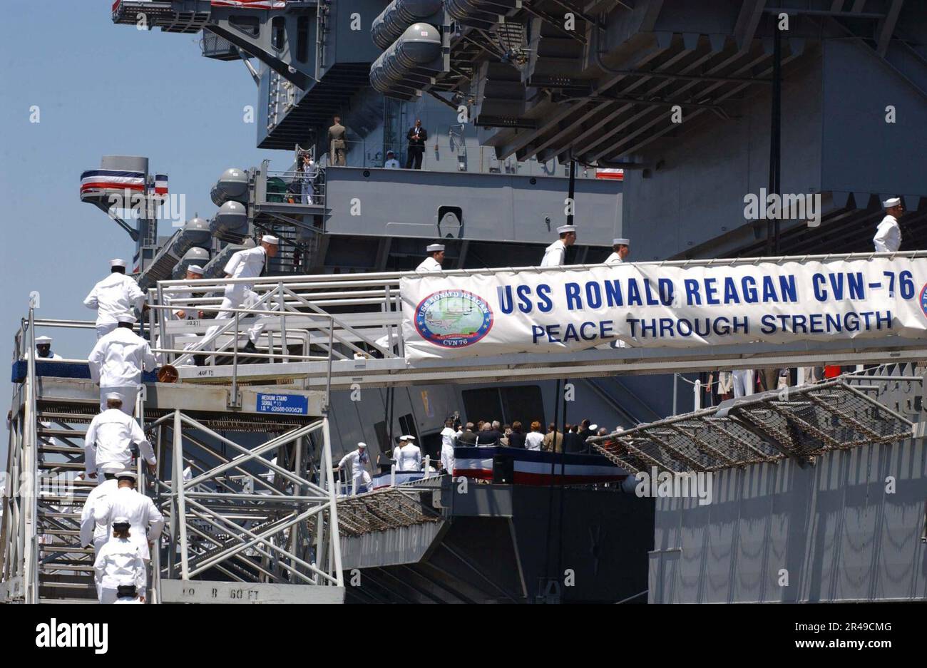 US Navy Crewmembers of the Navy's newest Nimitz-class aircraft carrier ...