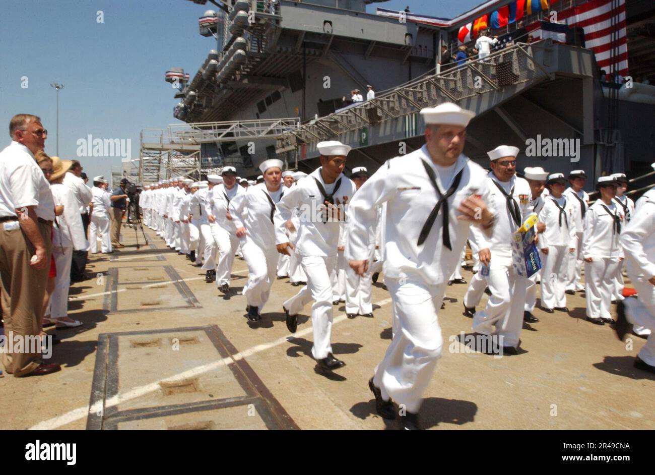 US Navy Crewmembers of the Navy's newest Nimitz-class aircraft carrier ...