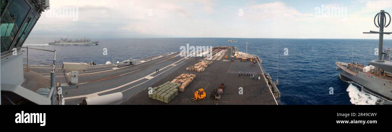 US Navy An MH-60S Knighthawk transfers ammunition from the flight deck ...