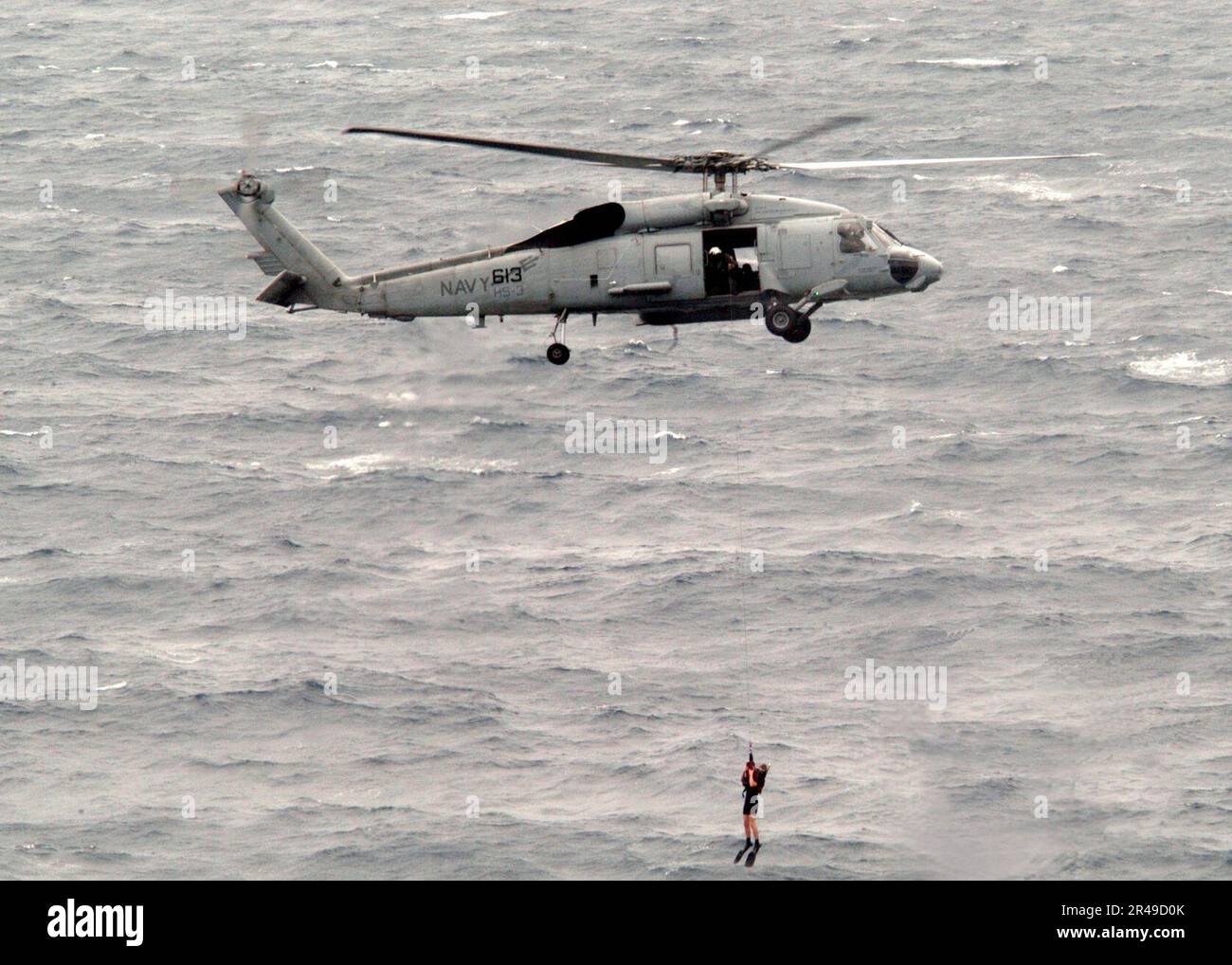 US Navy Search and Rescue (SAR) swimmers demonstrate SAR operations ...