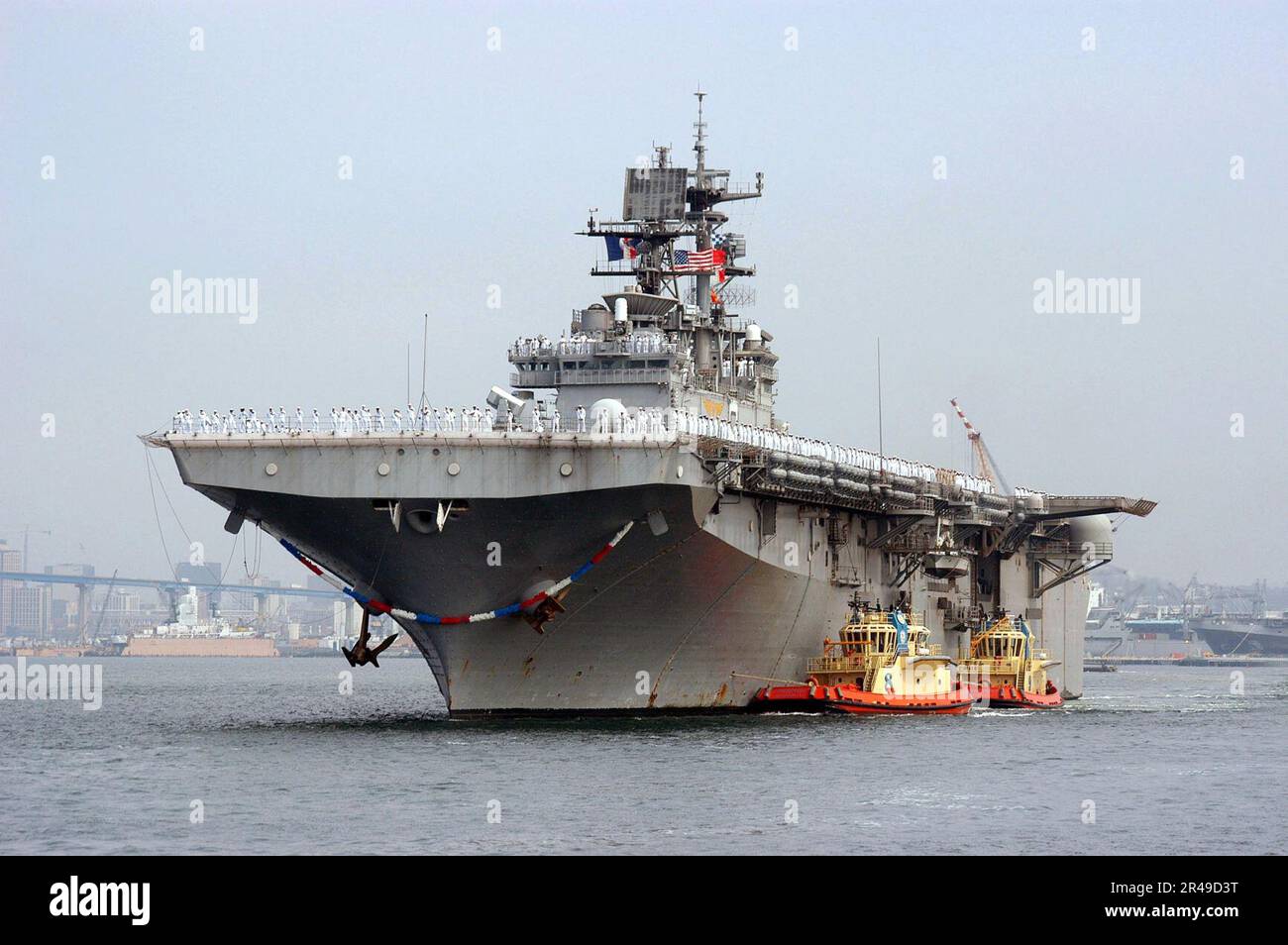 US Navy The crew off USS Bonhomme Richard (LHD 6) ''man the rails'' as ...