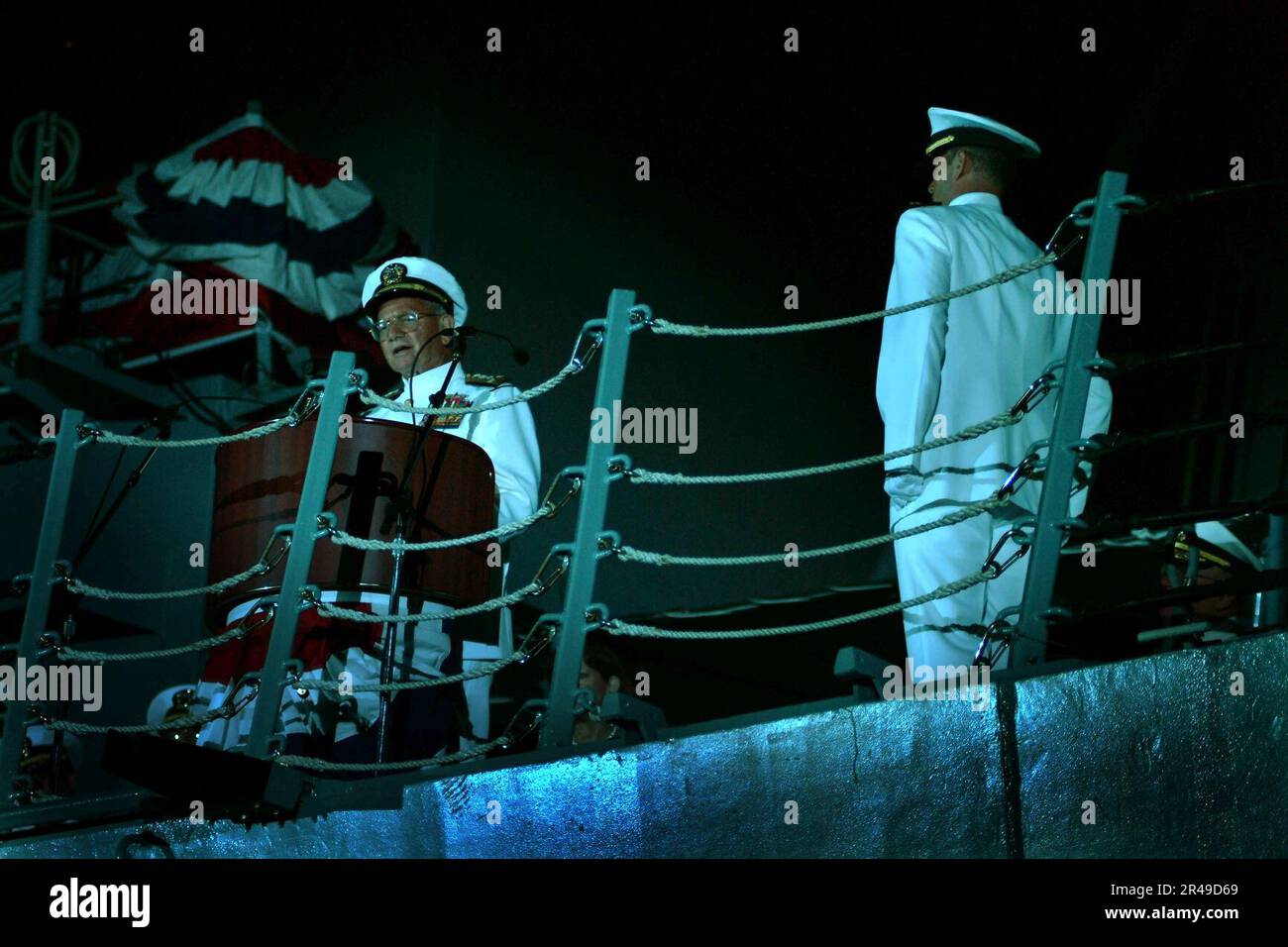 US Navy Vice Adm. Henry C. Mustin (Ret.) prepares to set the first ...