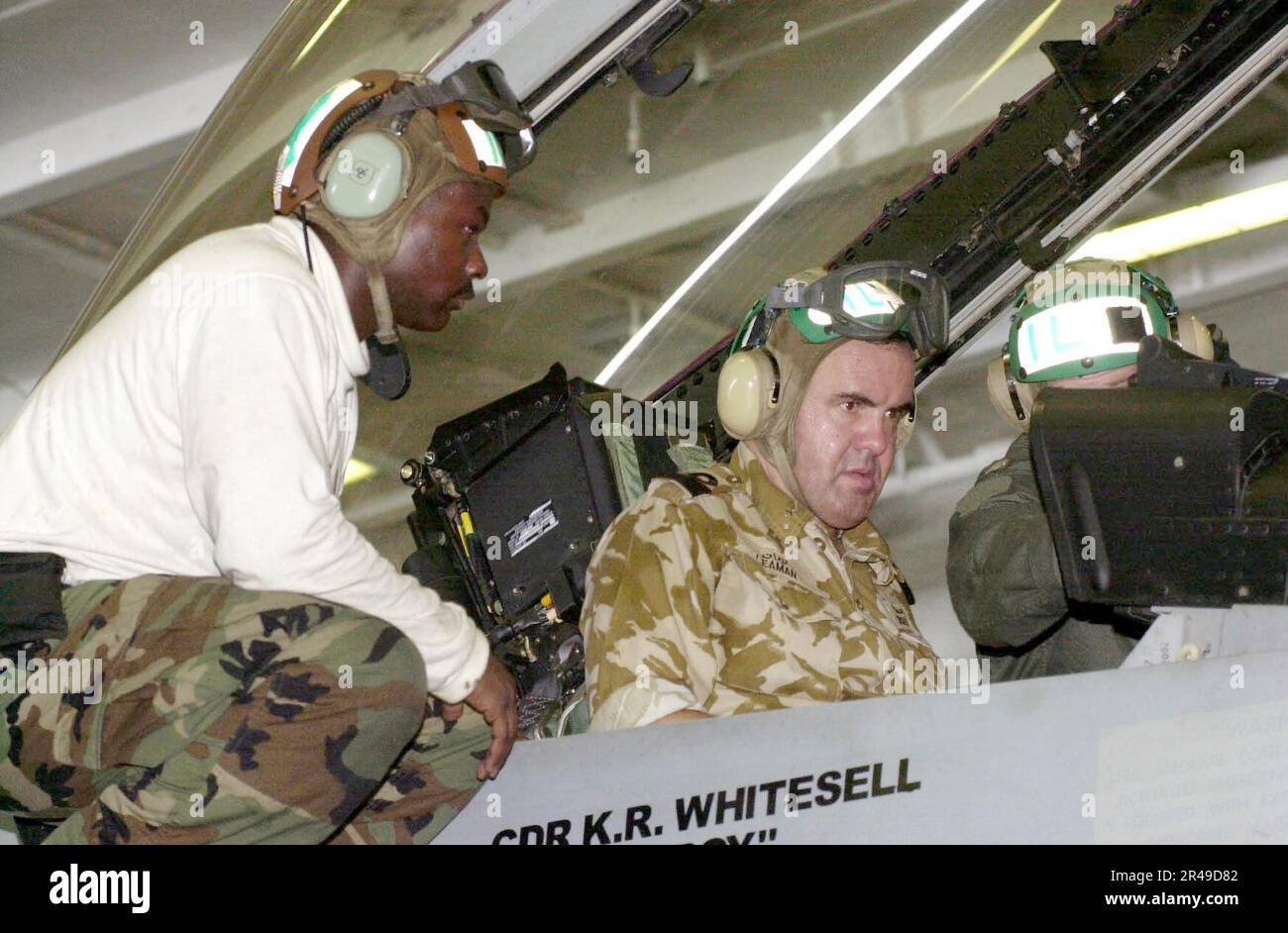 US Navy British Royal Navy Commodore, Richard Leaman, receives a ...