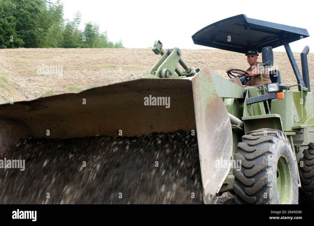 US Navy Equipment Operator Constructionman Chris Payne assigned to ...
