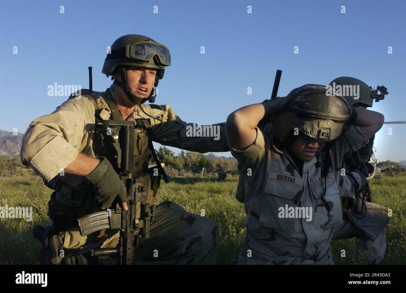 US Navy U.S. Navy SEAL (Sea, Air and Land) Team members secure a downed ...