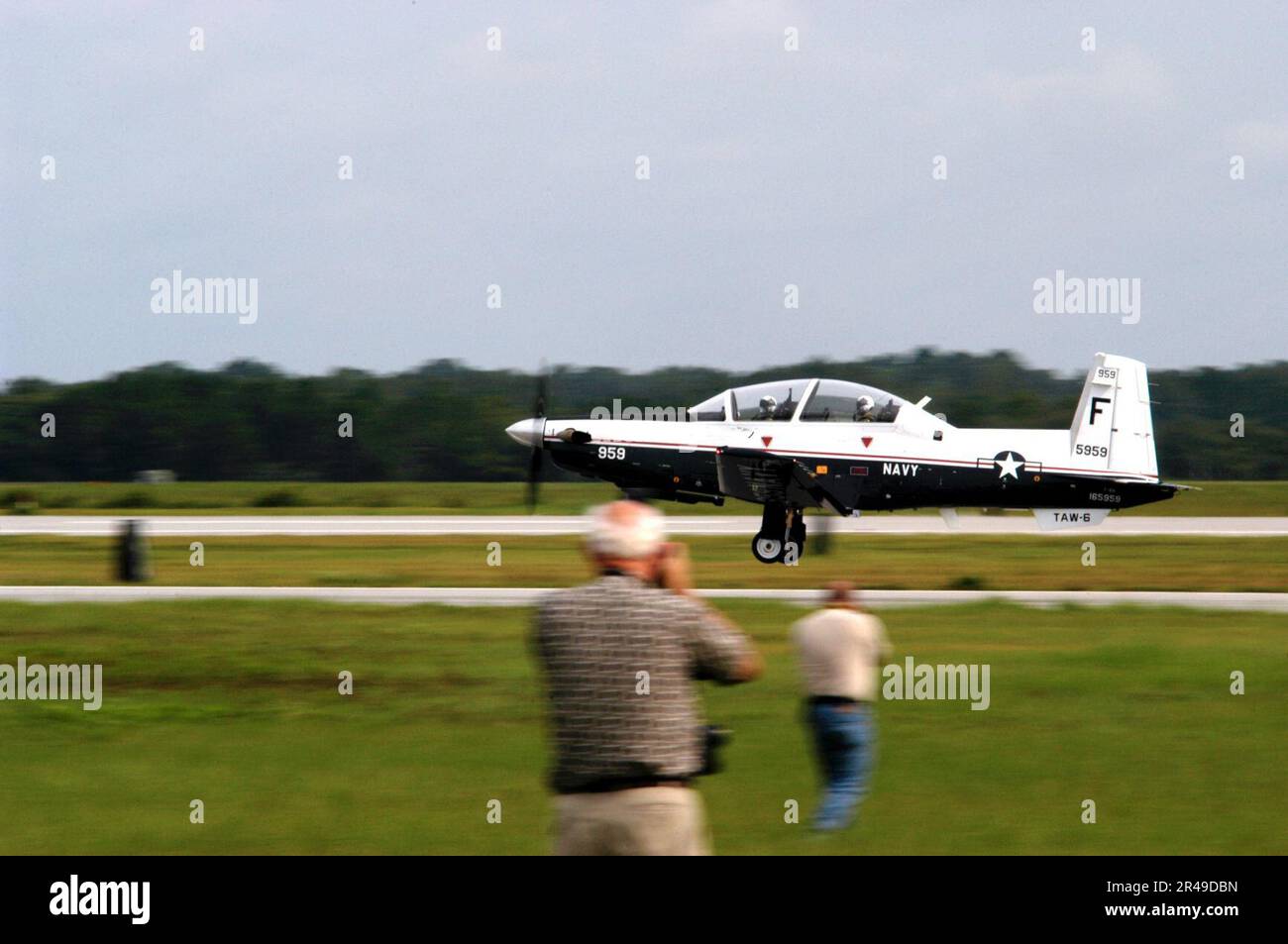 US Navy The T-6 Texan training aircraft takes off from the flight line ...