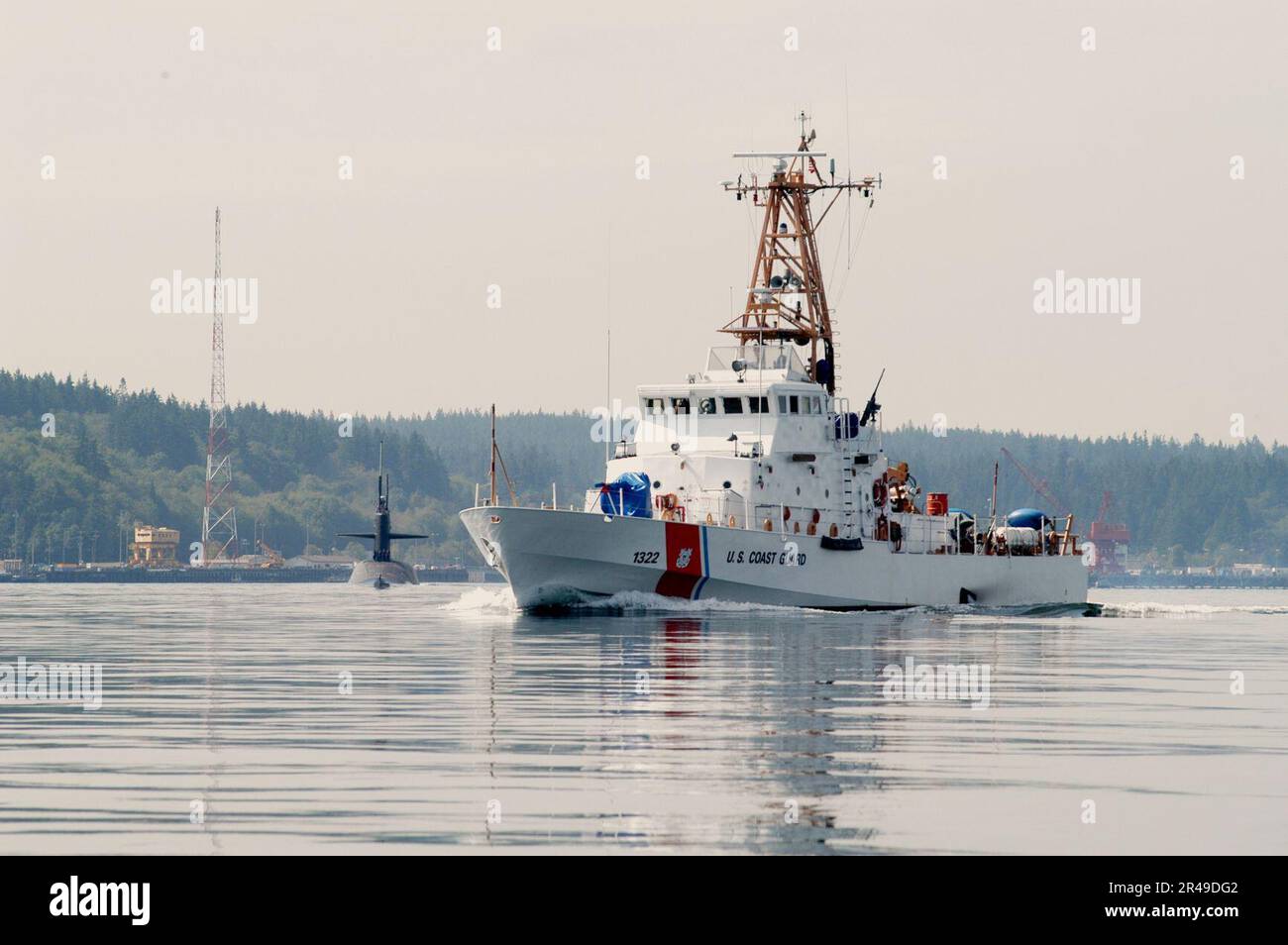 US Navy U.S. Coast Guard Cutter CuttyHunk (WPB 1322) escorts the Ohio ...