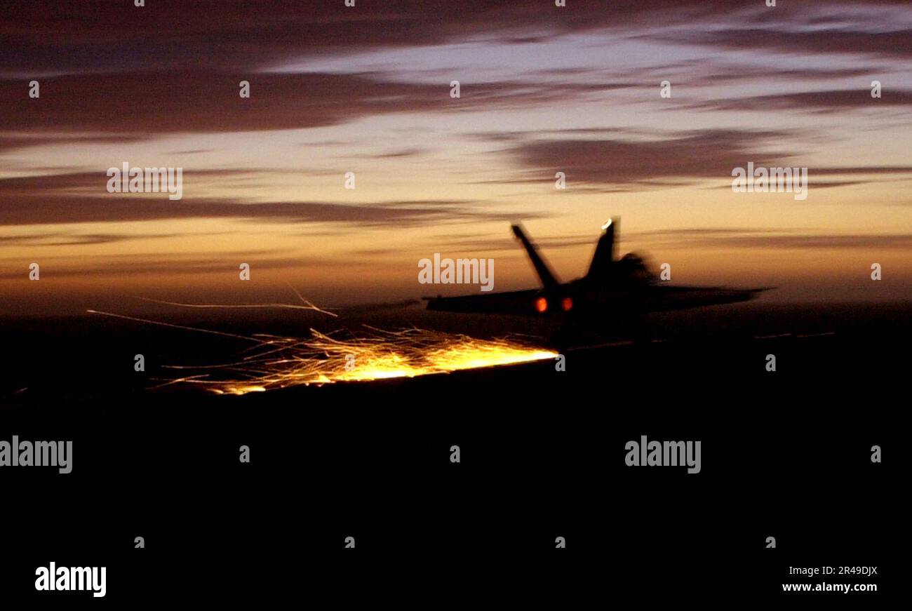 US Navy Sparks fly from the tailhook of an F-A-18F Super Hornet as it ...