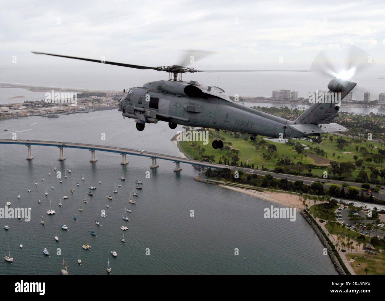 US Navy An SH-60 Seahawk flys near Naval Amphibious Base Coronado armed ...