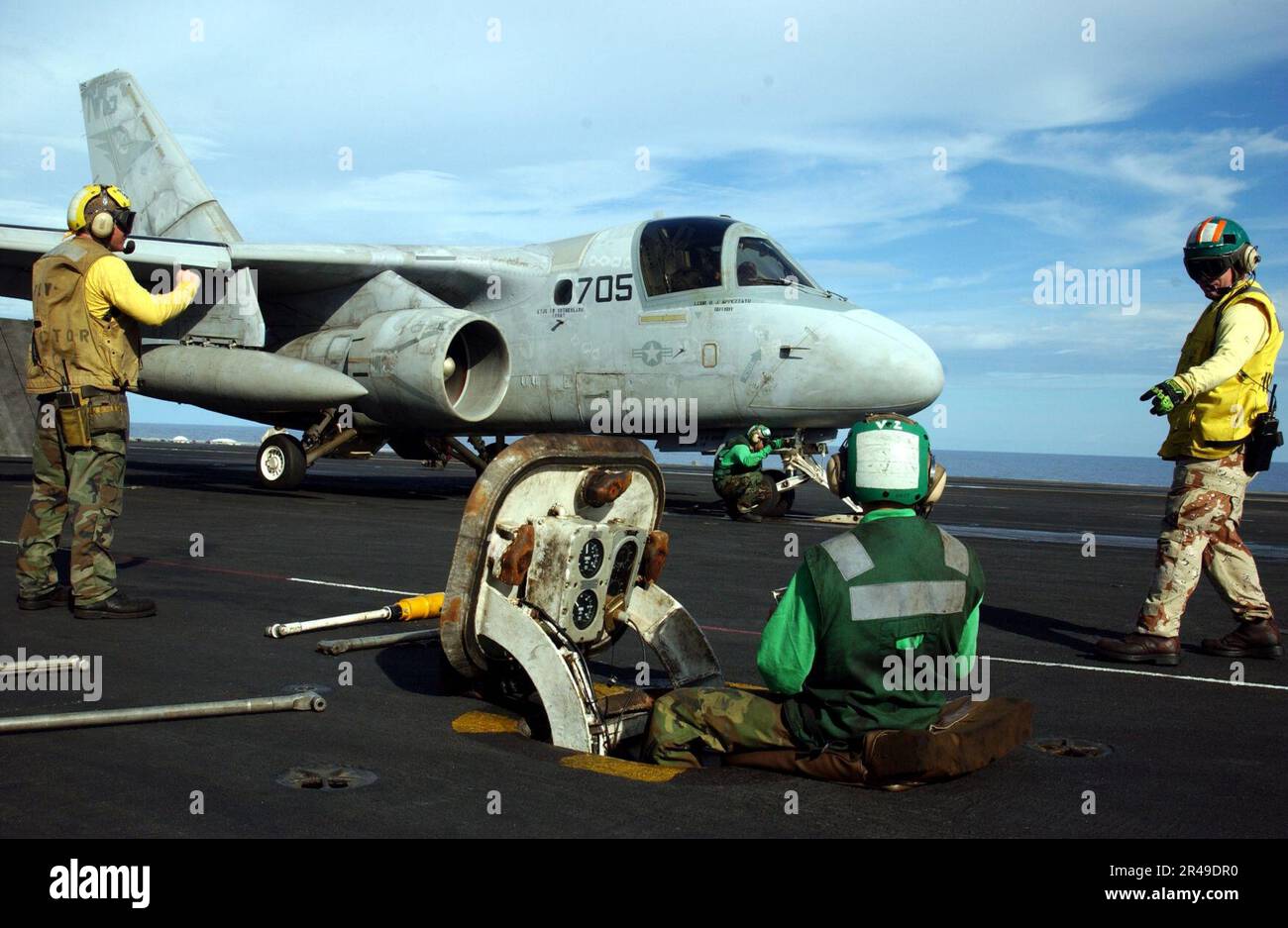 US Navy A flight deck ''Shooter'' looks to the center deck operator ...