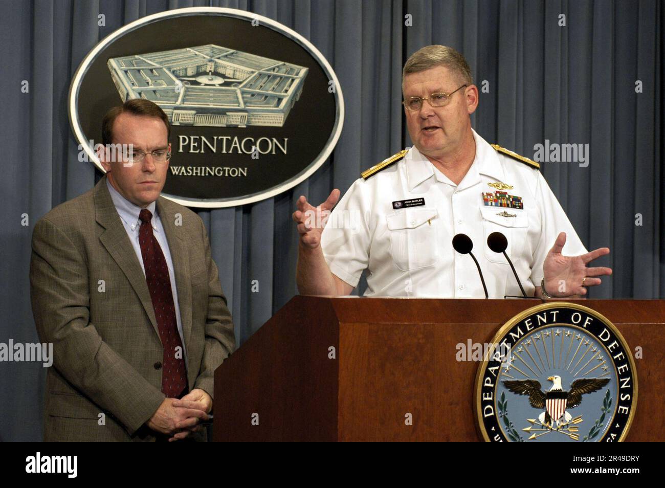 US Navy Rear Adm. John Butler responds to a technical question from a ...
