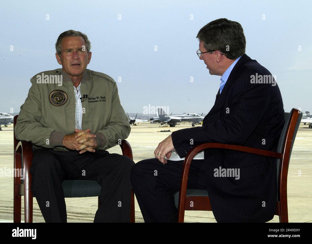 US Navy President George W. Bush speaks with American Forces Radio and ...