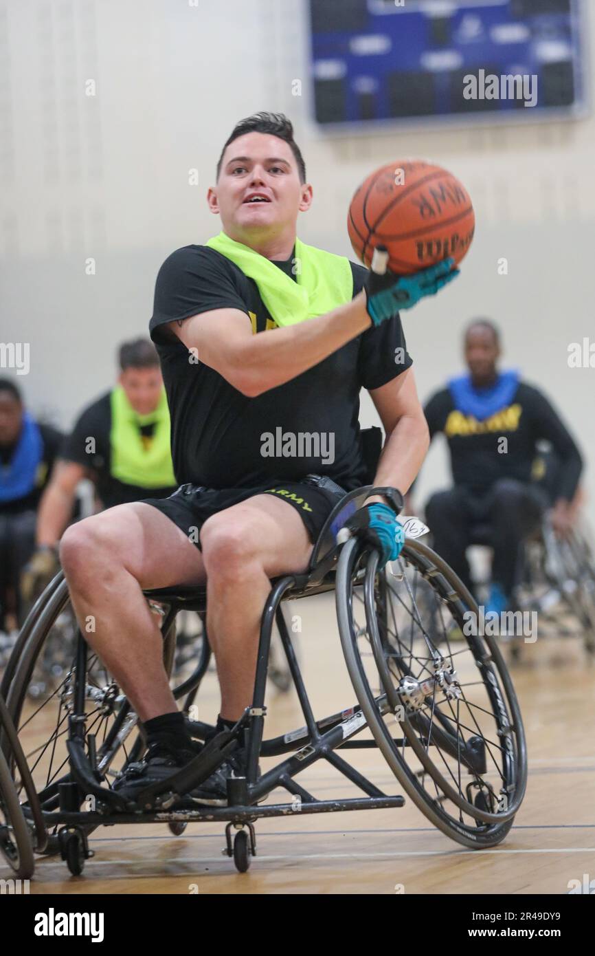 U.S. Army Soldiers playing basketball during the U.S. Army Adaptive ...