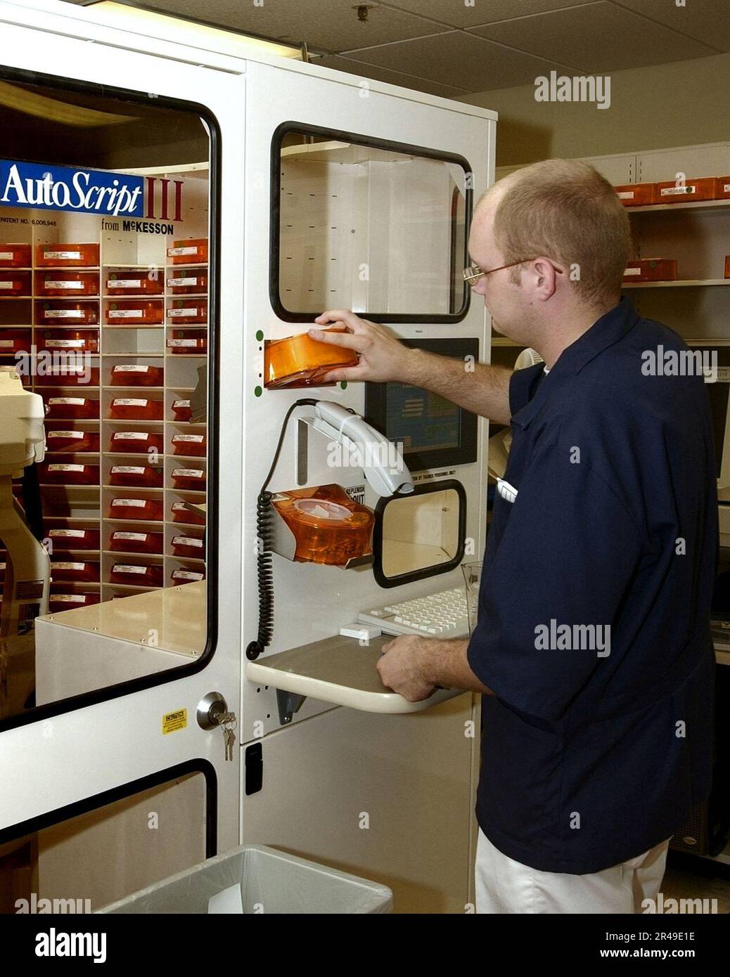 US Navy Hospitalman Randy Connelly, of Breezewood, Penna., feeds a ...
