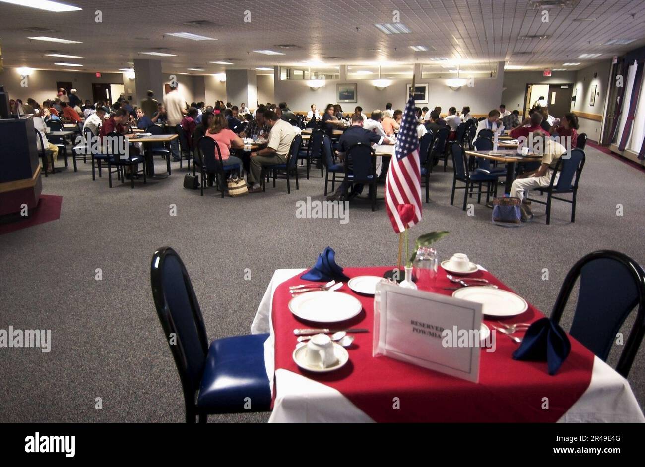 US Navy Visitors and staff are seen eating lunch in the main dinning ...