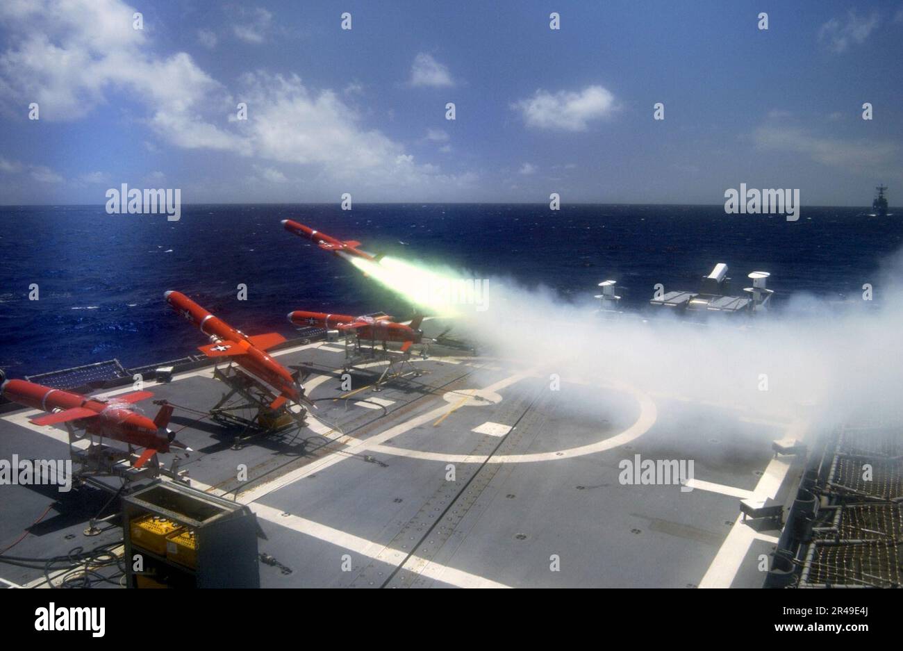 US Navy A target drone is fired off the flight deck aboard USS Cushing ...