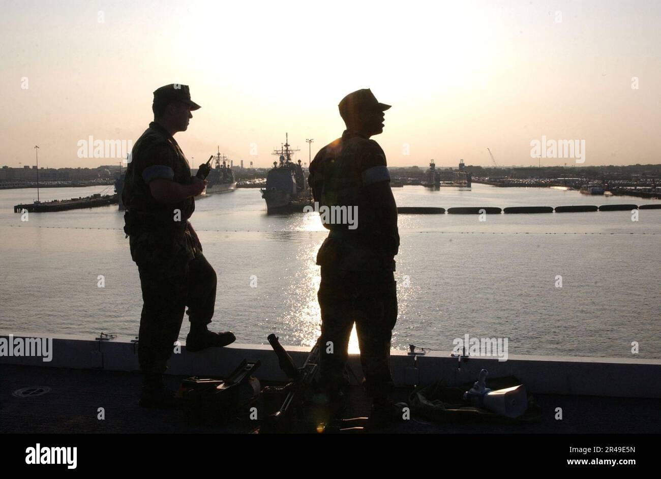 US Navy Sailors stand a force protection watch while transiting from ...