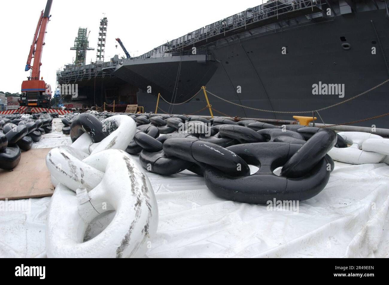 US Navy Anchor chains for USS Kitty Hawk (CV 63) sit on the dock ...