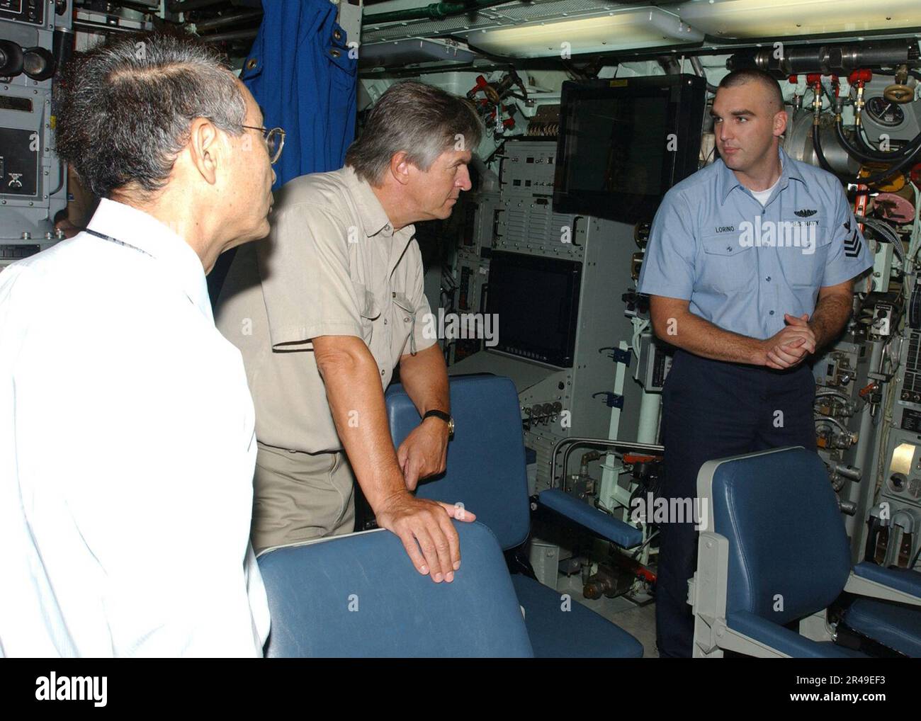 US Navy The Japanese Ambassador to Bahrain, Takao Natusme, left, and ...
