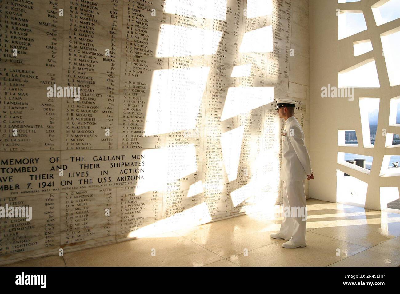 US Navy hief Journalist Tim Paynter scans the names of 1,177 Sailors ...